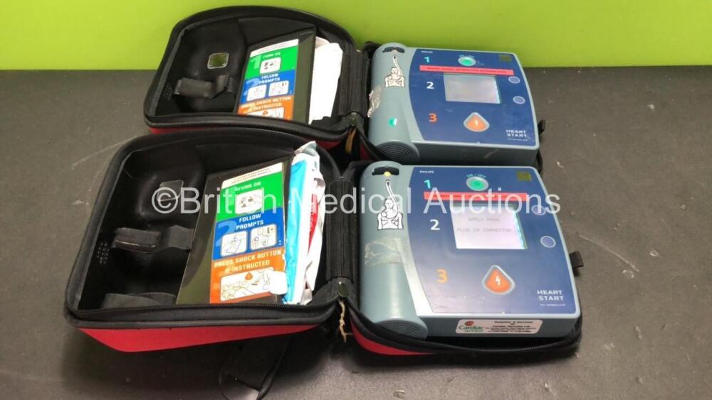 2 x Philips Heartstart FR2 Defibrillators with 2 x Philips M3863A ...