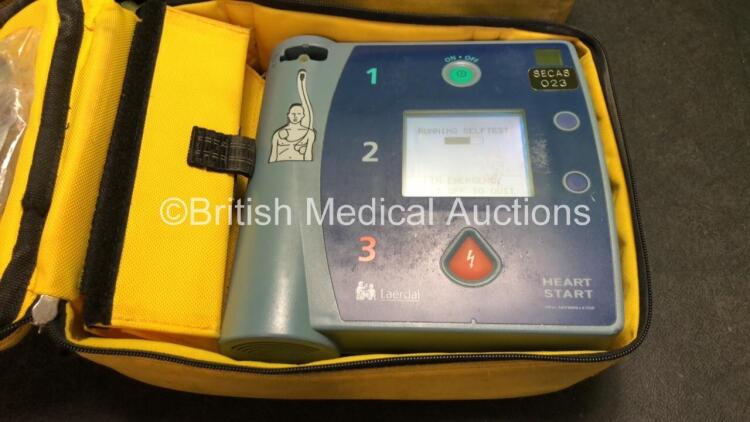 1 x Philips Heartstart FR2 Defibrillator and 1 x Laerdal Heartstart FR2 ...