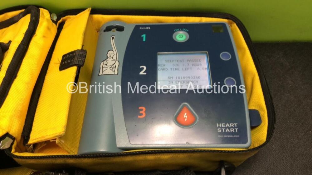 1 x Philips Heartstart FR2 Defibrillator and 1 x Laerdal Heartstart FR2 ...