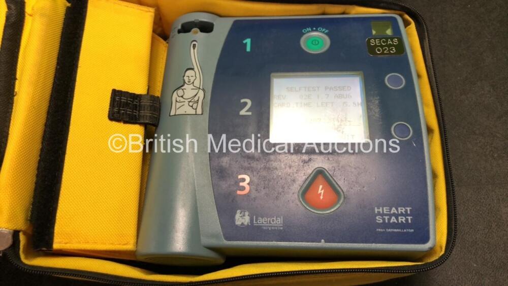 1 x Philips Heartstart FR2 Defibrillator and 1 x Laerdal Heartstart FR2 ...