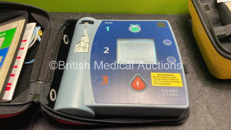 2 x Philips Heartstart FR2 Defibrillators and 1 x Laerdal Heartstart ...