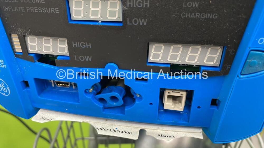 1 x Datascope Trio Patient Monitor on Stand and 1 x GE Dinamap ProCare ...