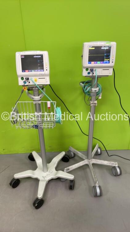 2 x Fukuda Denshi DS-7100 Dynascope Monitors on Stands ECG, SpO2, NIBP ...
