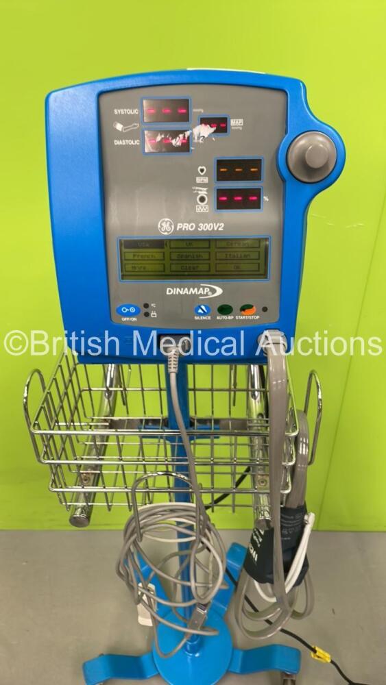 1 x GE ProCare Vital Signs Monitor on Stand, 1 x GE Dinamap Pro 300V2 ...