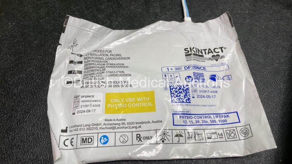 2 x Medtronic Physio-Control Lifepak 1000 Defibrillators with 4 x ...