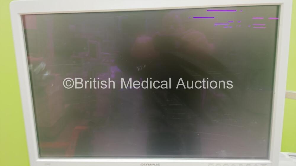 2 x Olympus Stack Trolleys with Olympus OEV261H Monitor, Olympus ECG ...