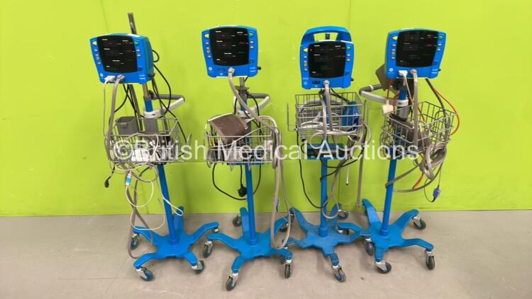 3 x GE Dinamap Carescape V100 Vital Signs Monitors on Stands and 1 x GE ...