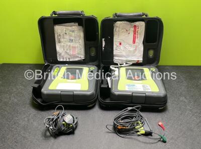 2 x Zoll AED PRO Defibrillators (Both Power Up) with 2 x 3 Lead ECG ...
